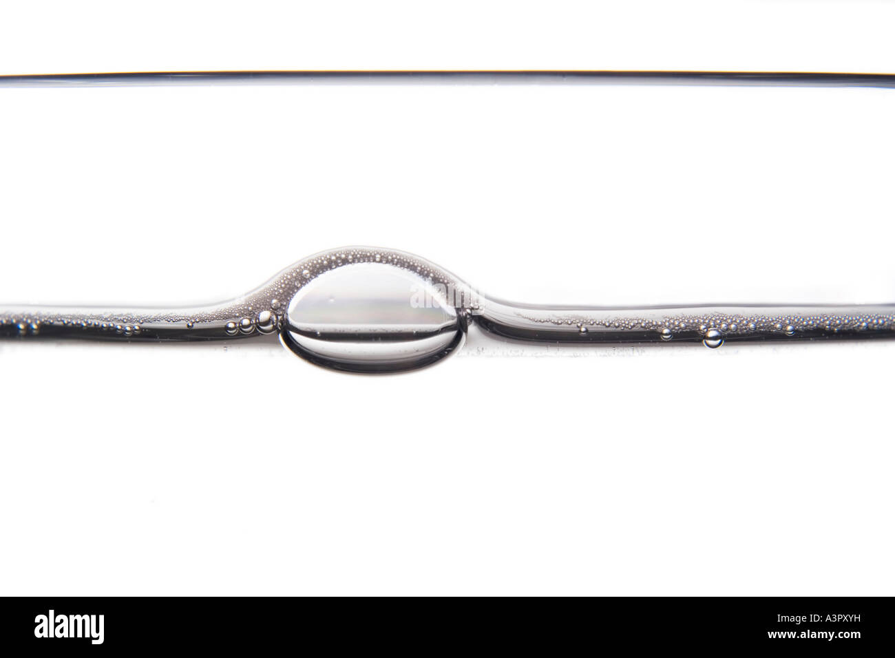 Glass edge with bubbles against a white background Stock Photo - Alamy