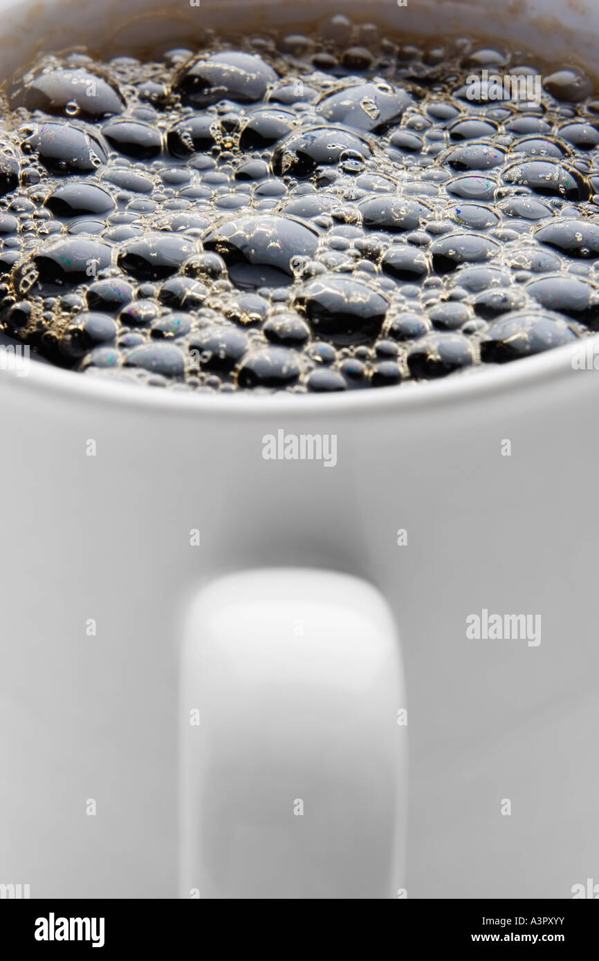 Cup of coffee with bubbles Stock Photo - Alamy