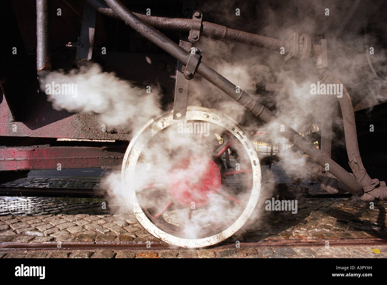 Wheel of a steam locomotive Stock Photo - Alamy