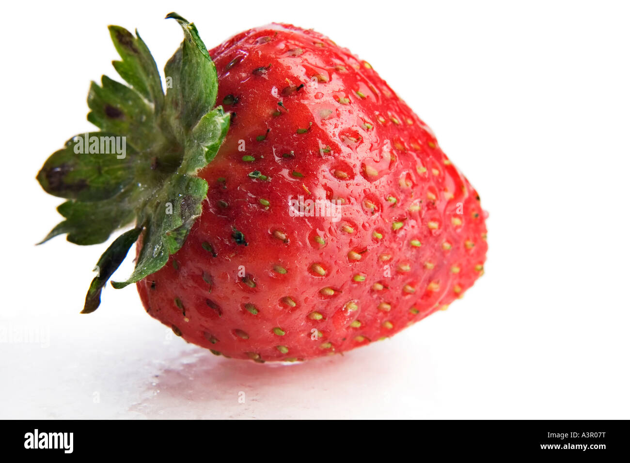 Strawberry on white Stock Photo - Alamy
