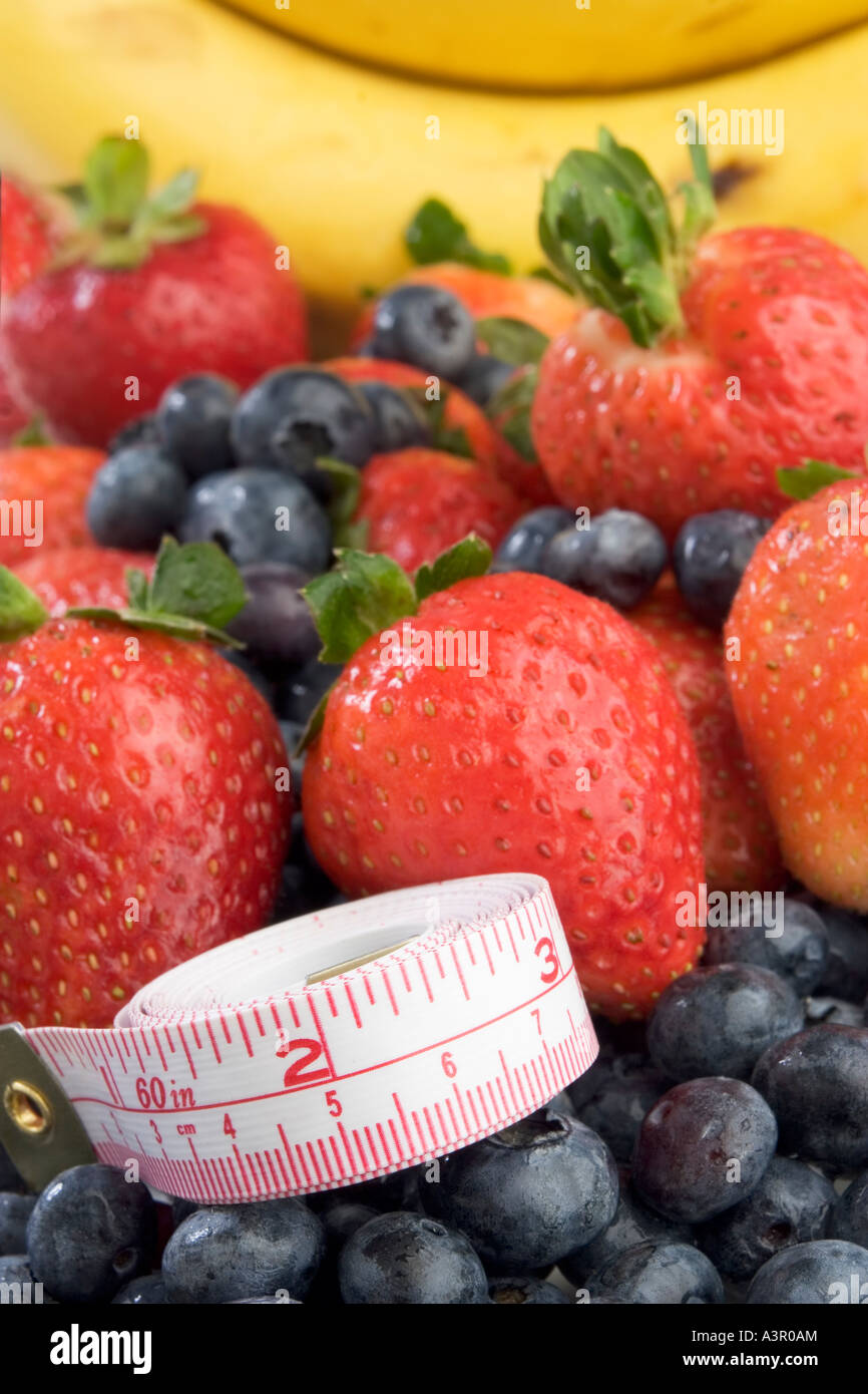 Fruit with a tape measure Stock Photo - Alamy