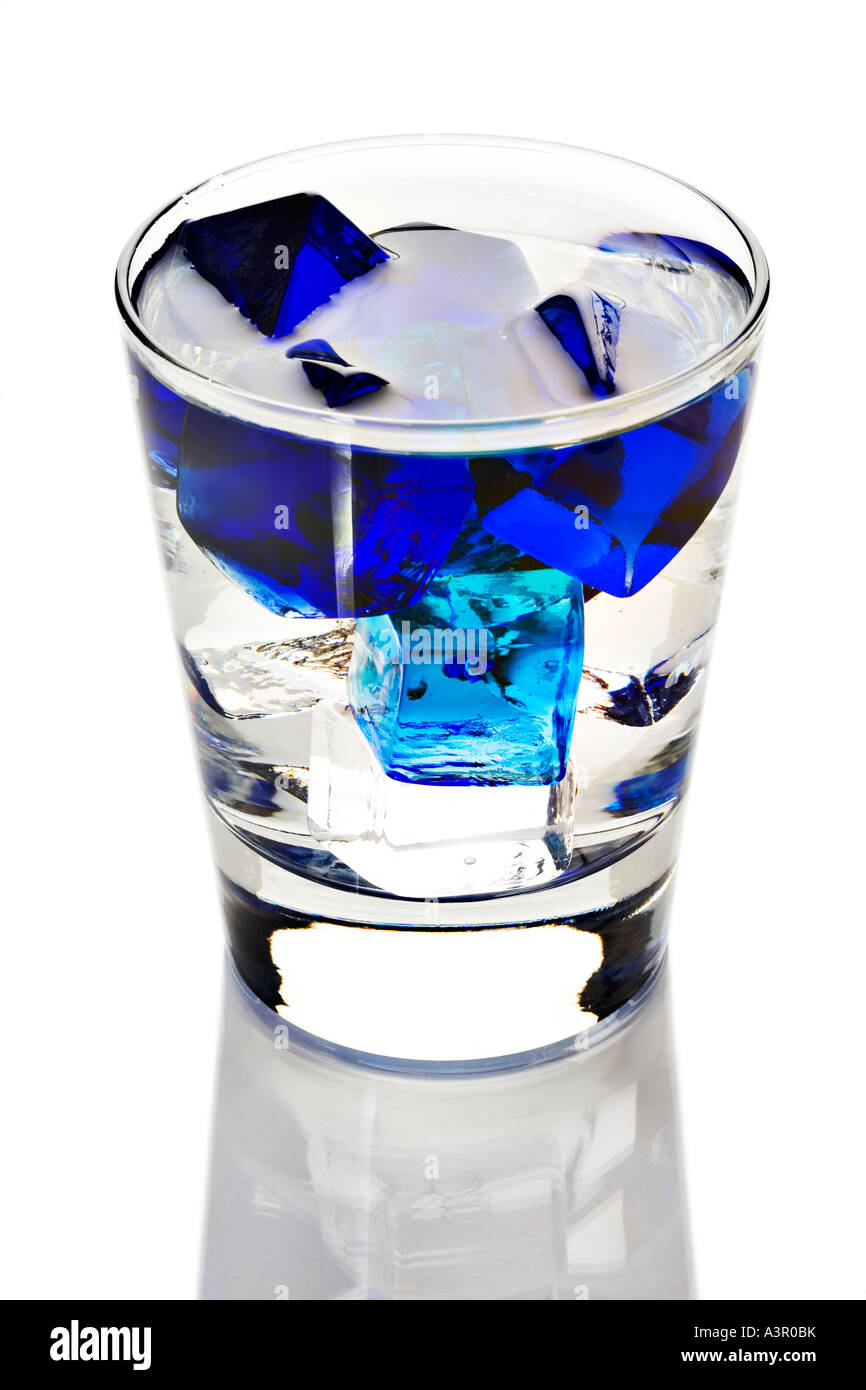 Clear beverage with blue ice cubes Stock Photo - Alamy