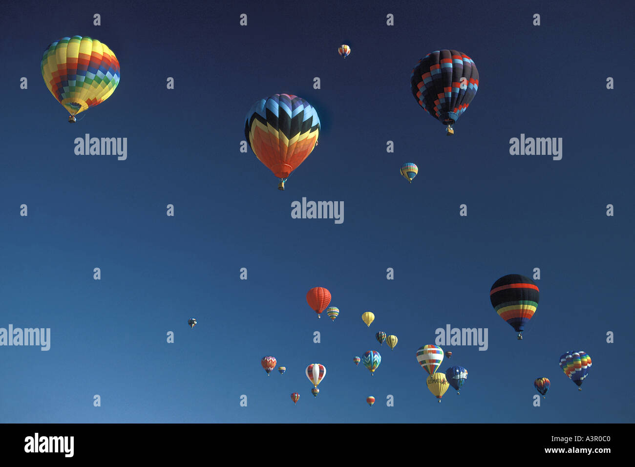 Colorful balloon cluster in the air Stock Photo - Alamy