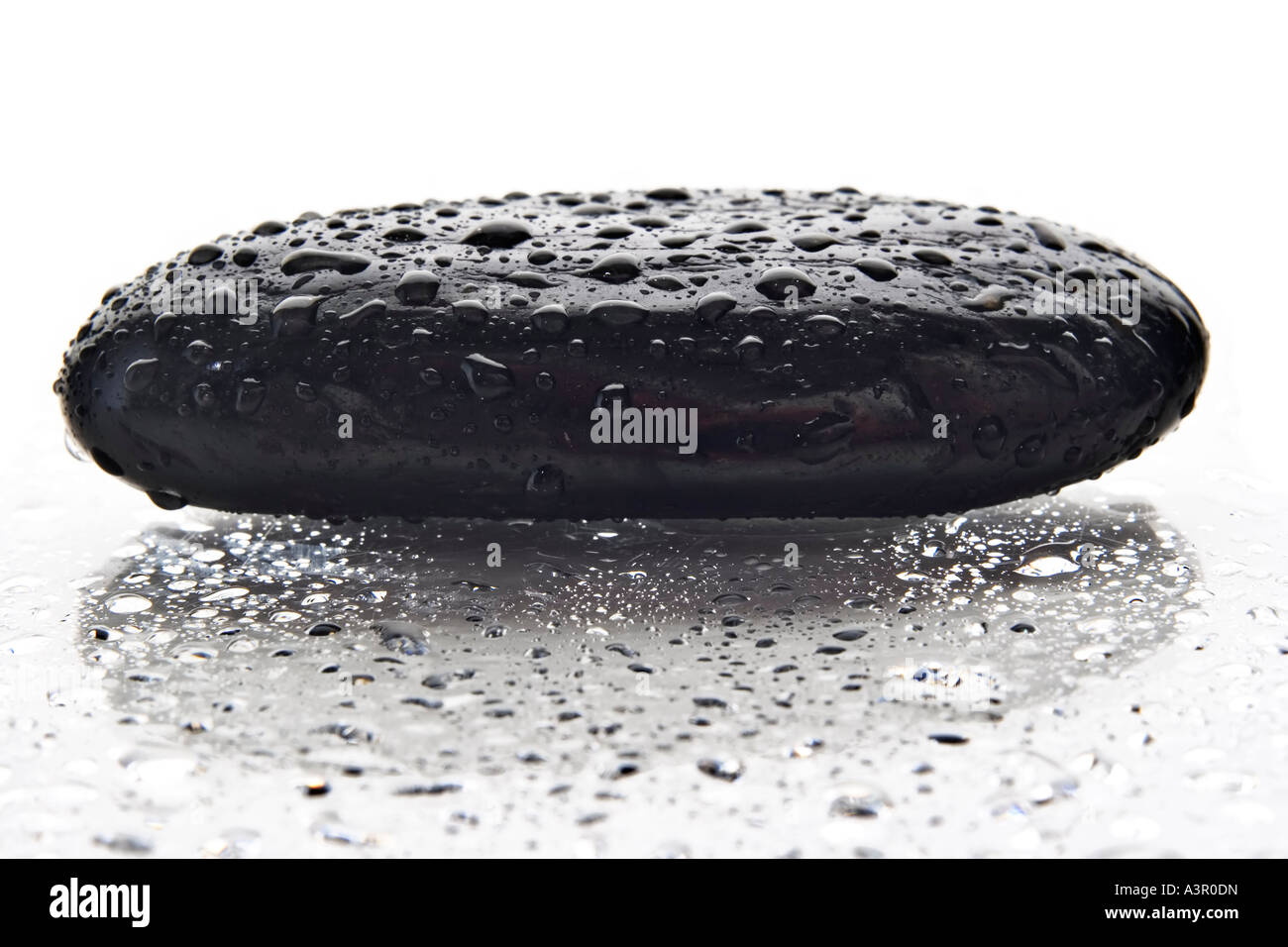 Wet river rocks on white Stock Photo - Alamy