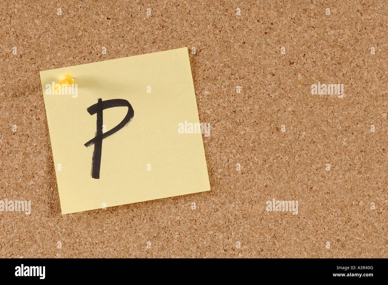Message cork board with alphabet letters Stock Photo - Alamy