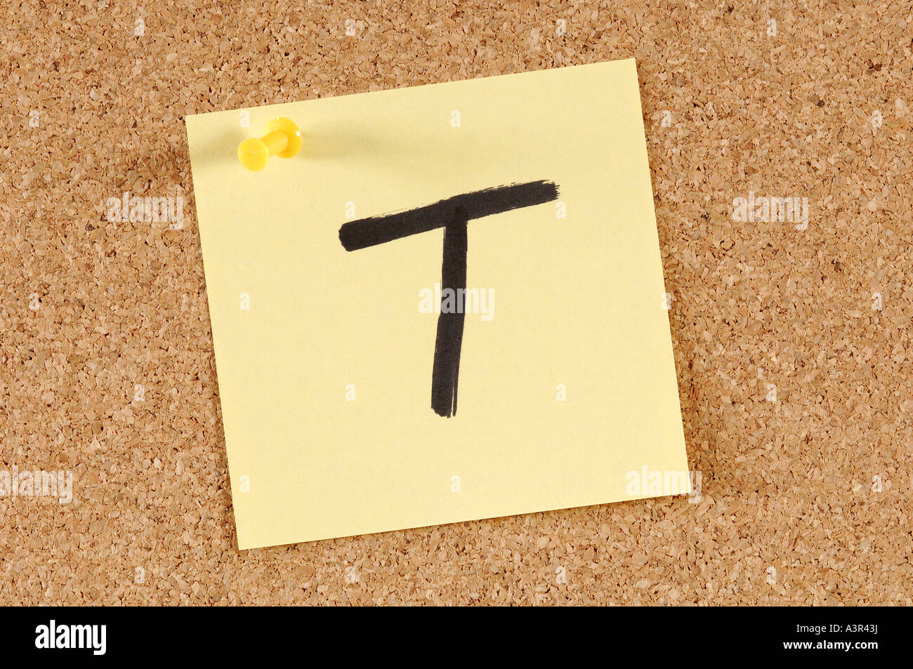 Message cork board with alphabet letters Stock Photo - Alamy