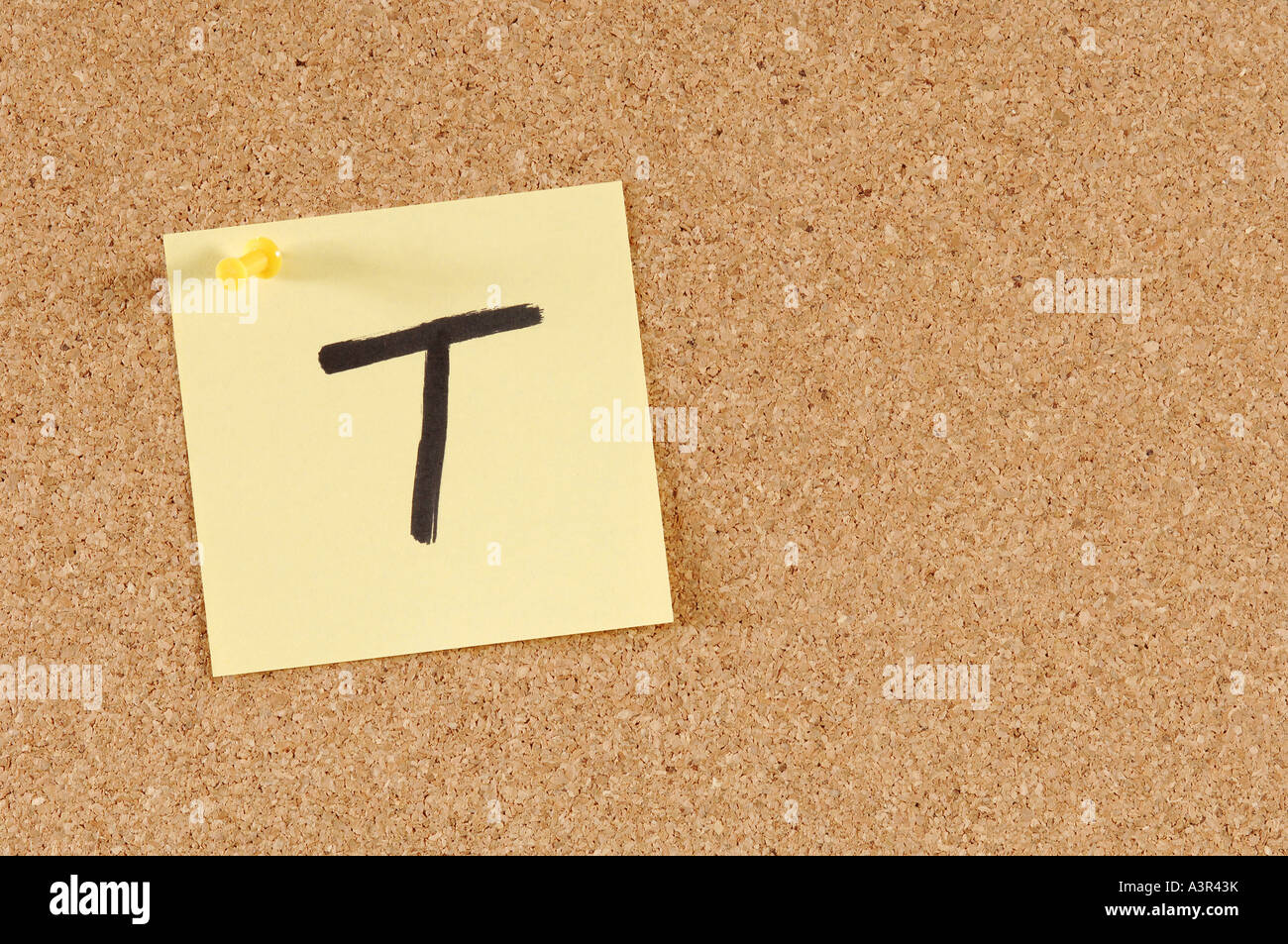 Message cork board with alphabet letters Stock Photo - Alamy