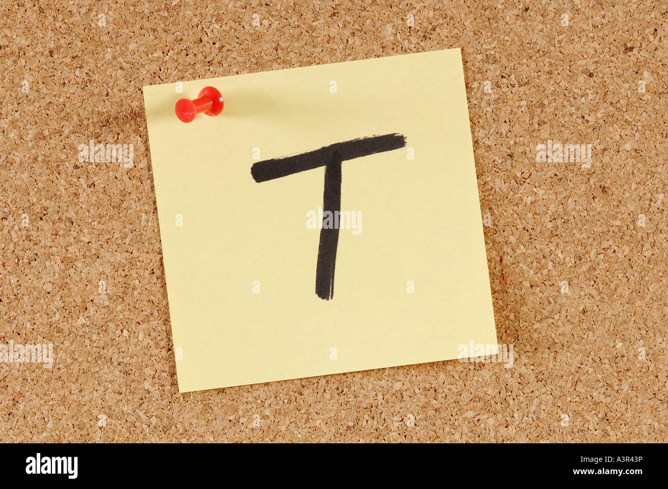 Message cork board with alphabet letters Stock Photo - Alamy