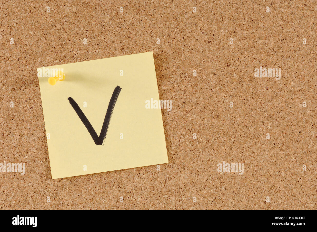 Message cork board with alphabet letters Stock Photo - Alamy