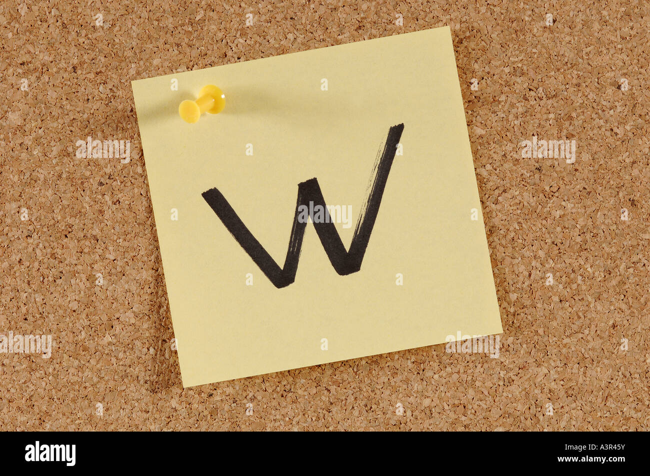 Message cork board with alphabet letters Stock Photo - Alamy