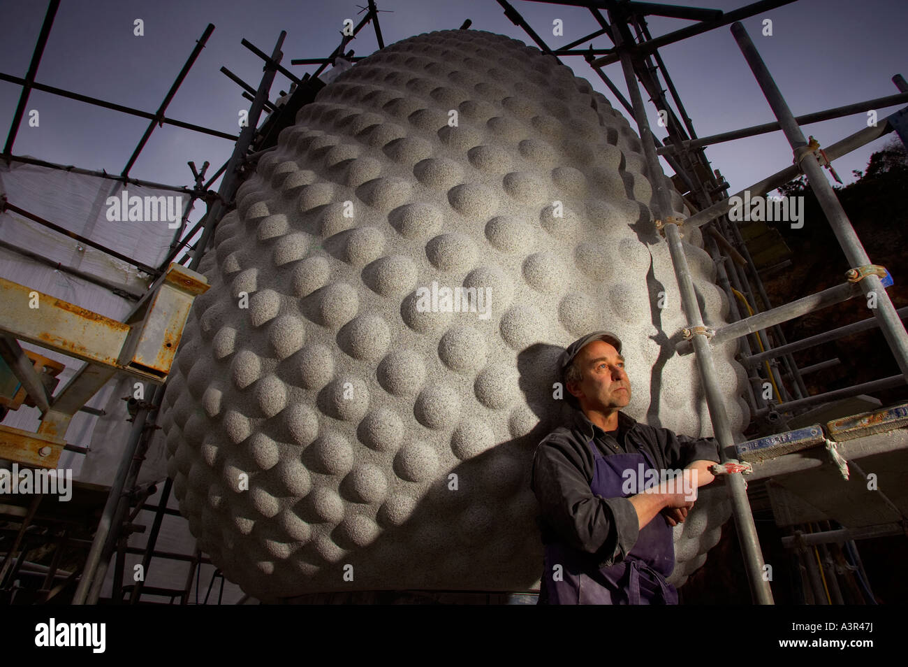 Peter Randall-Page with his granite sculpture The Seed at De Lank ...
