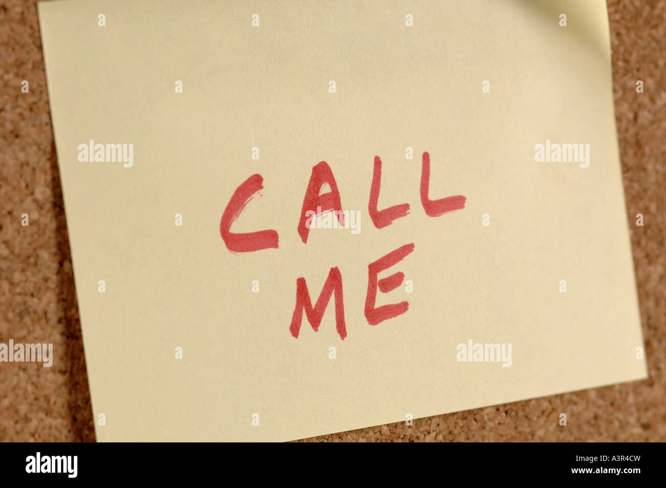 note memo with call me writing Stock Photo - Alamy