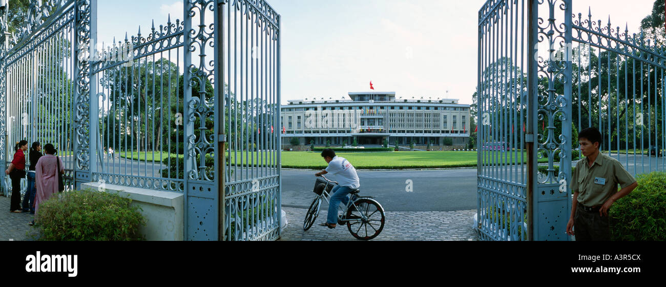 Tourists Looking through the wrought iron gates of the Reunification ...