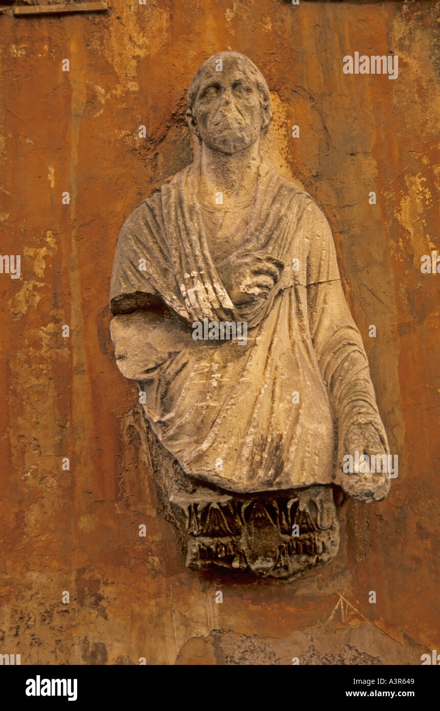 Roman statue set in wall Via di Canova Rome Italy Stock Photo - Alamy