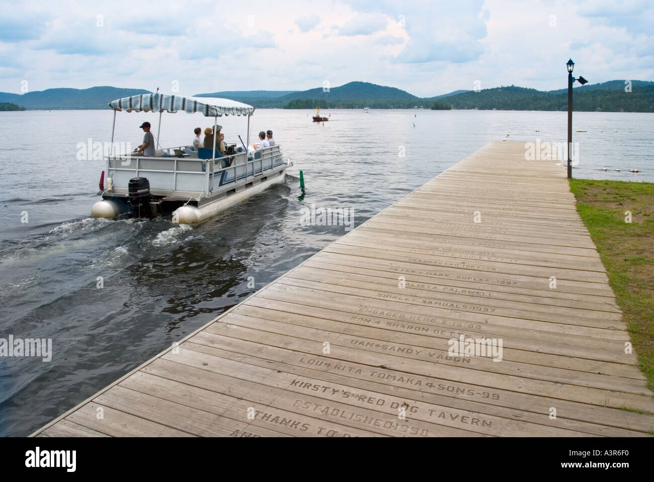 Boardwalk and pontoon boat Arrowhead Park Fourth Lake Inlet New York ...