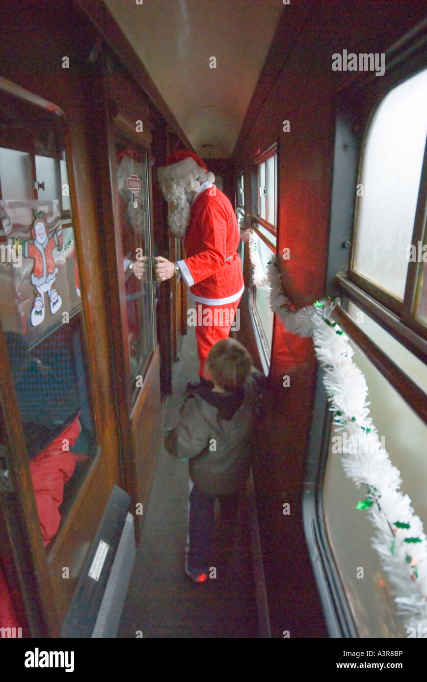 Father Christmas ;Railway carriage ; corridor ; Old steam train ;Ribble ...