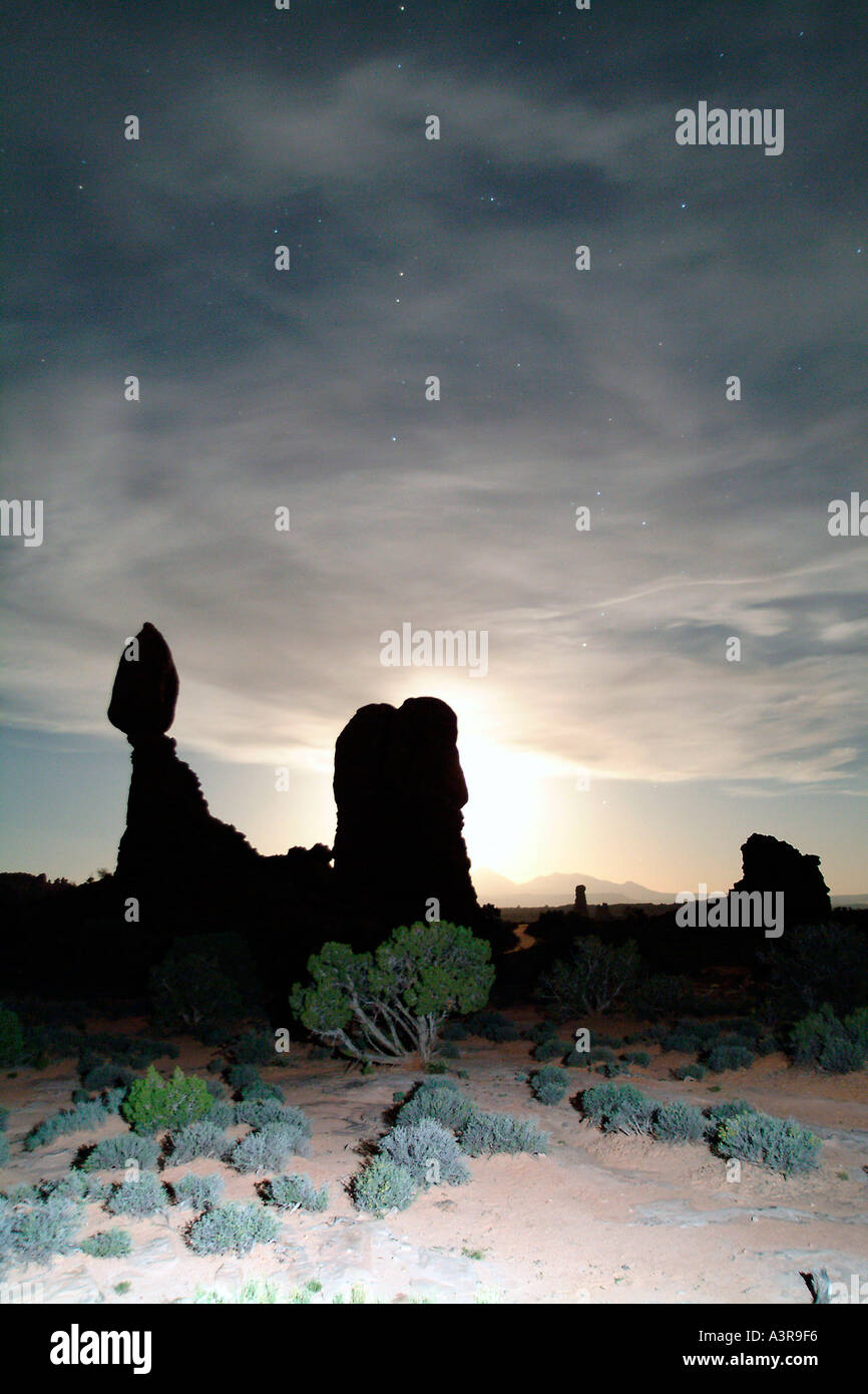 Rock monoliths lit up by the full moon in Arches national park Utah ...