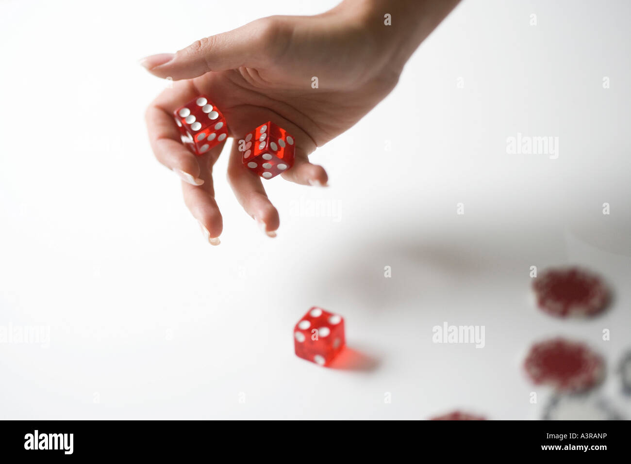 hands rolling dice Stock Photo - Alamy