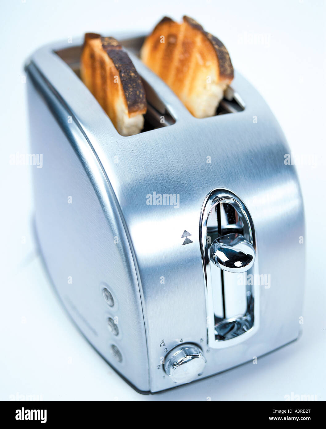 Silver toaster with toasted bread Stock Photo - Alamy