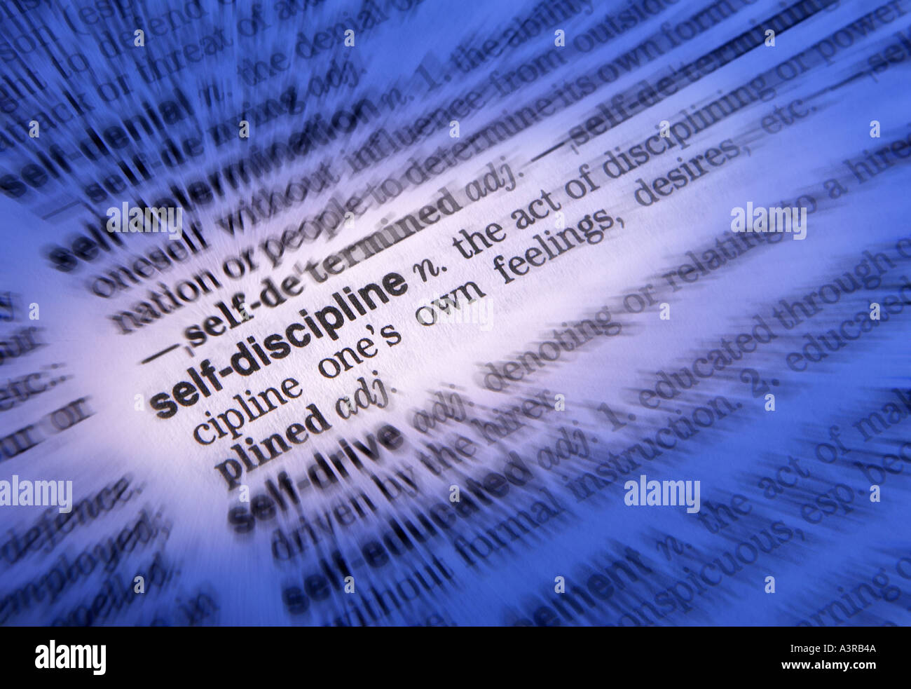 CLOSE UP OF DICTIONARY PAGE SHOWING DEFINITION OF THE WORDS SELF ...