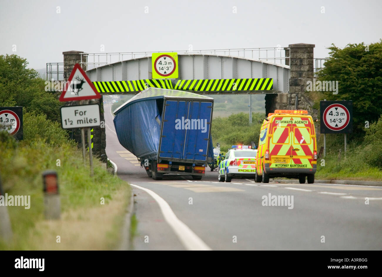 A lorry stuck under railway bridge on Goss Moor, Cornwall Stock Photo ...