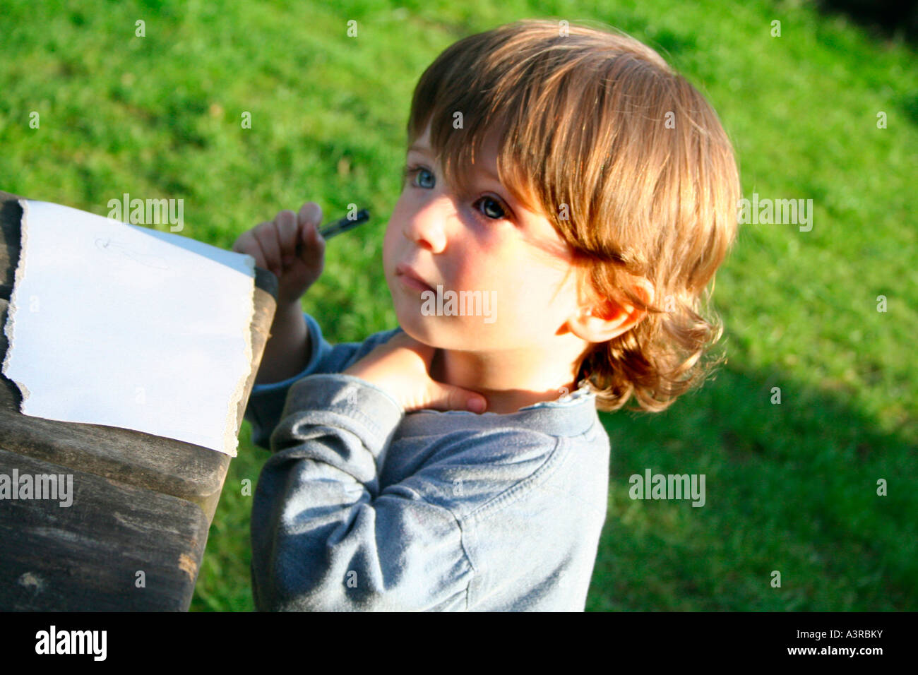 little boy learning to write Stock Photo - Alamy