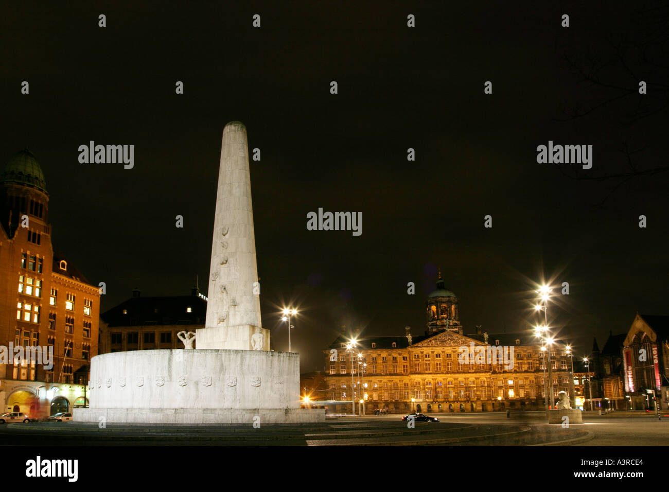 Royal Palace Dam Square at night Amsterdam Stock Photo - Alamy