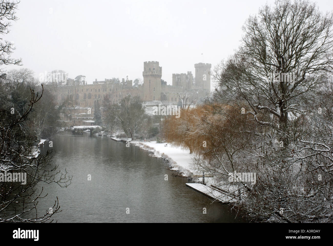 Warwick Castle and River Avon in winter, Warwickshire, England, UK ...