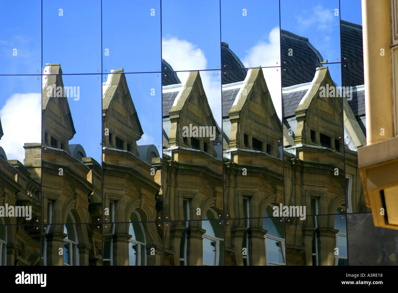 The old and the new reflected in buildings of Boar Lane Leeds Yorkshire ...