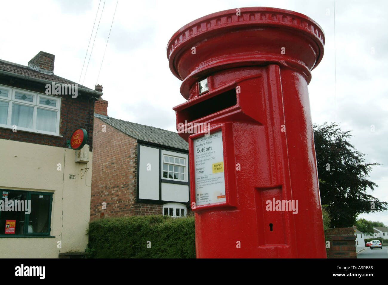 A red british pillar box Stock Photo - Alamy