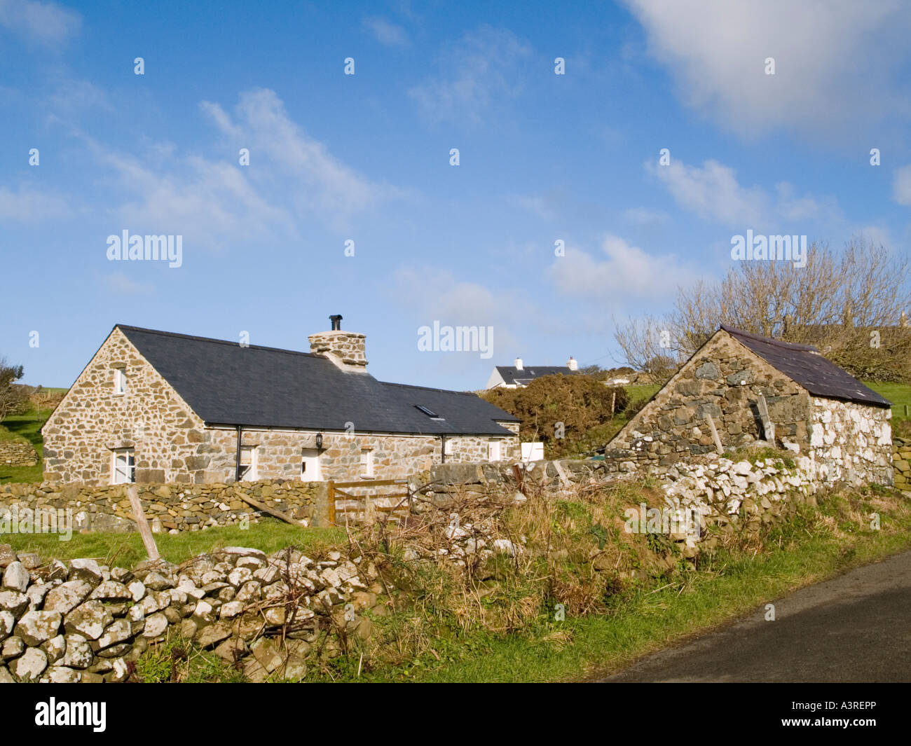 Traditional single storey traditional stone cottage with slate roof ...