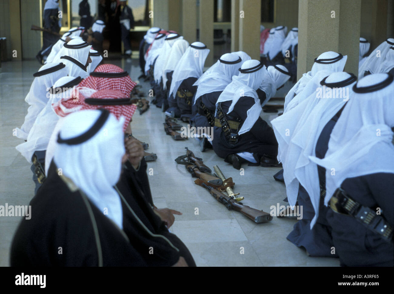 Saudi royal bodyguard kneel for prayers in Riyadh, Saudi Arabia Stock ...