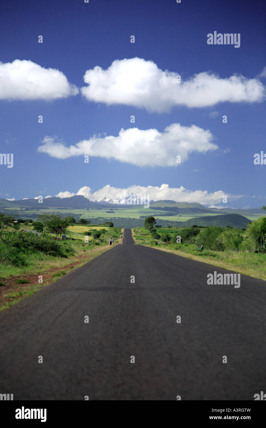 A snow topped Mount Kenya against a vivd blue sky Stock Photo - Alamy