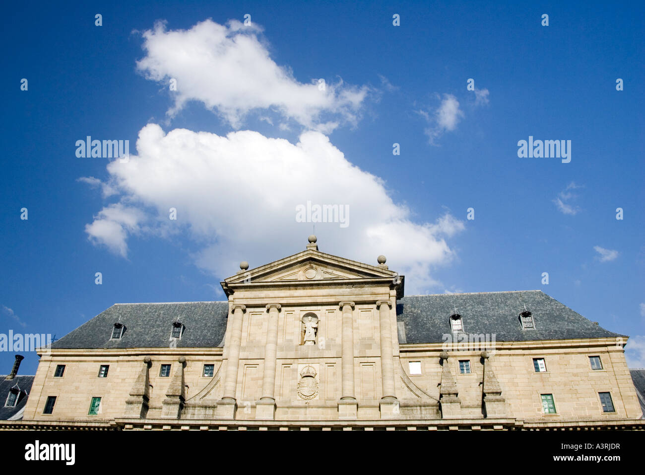 The Ionic style pediment and columns on top of El Escorial facade Spain ...
