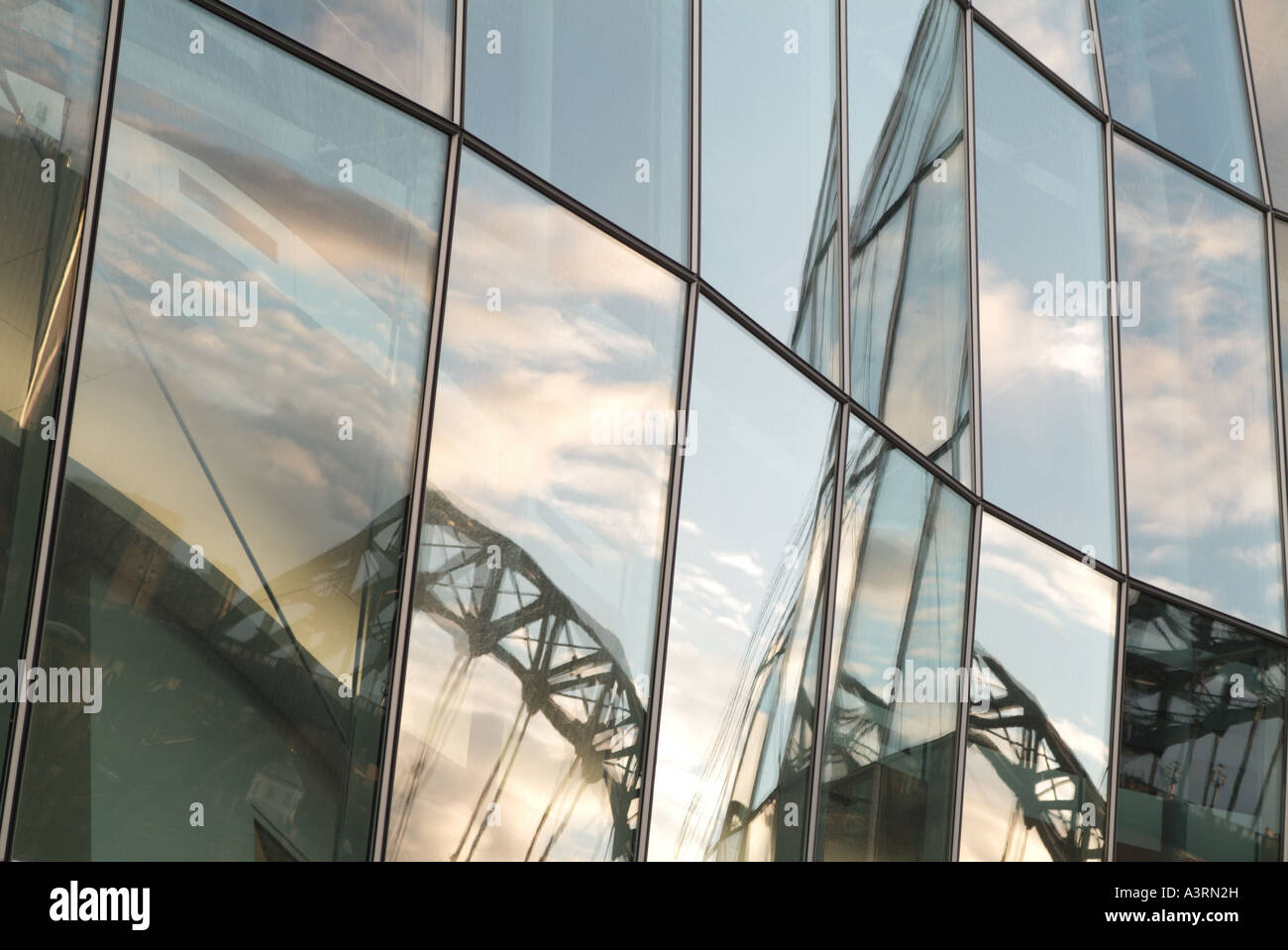 Tyne Bridge reflected in the glass of the Gateshead Sage music centre ...