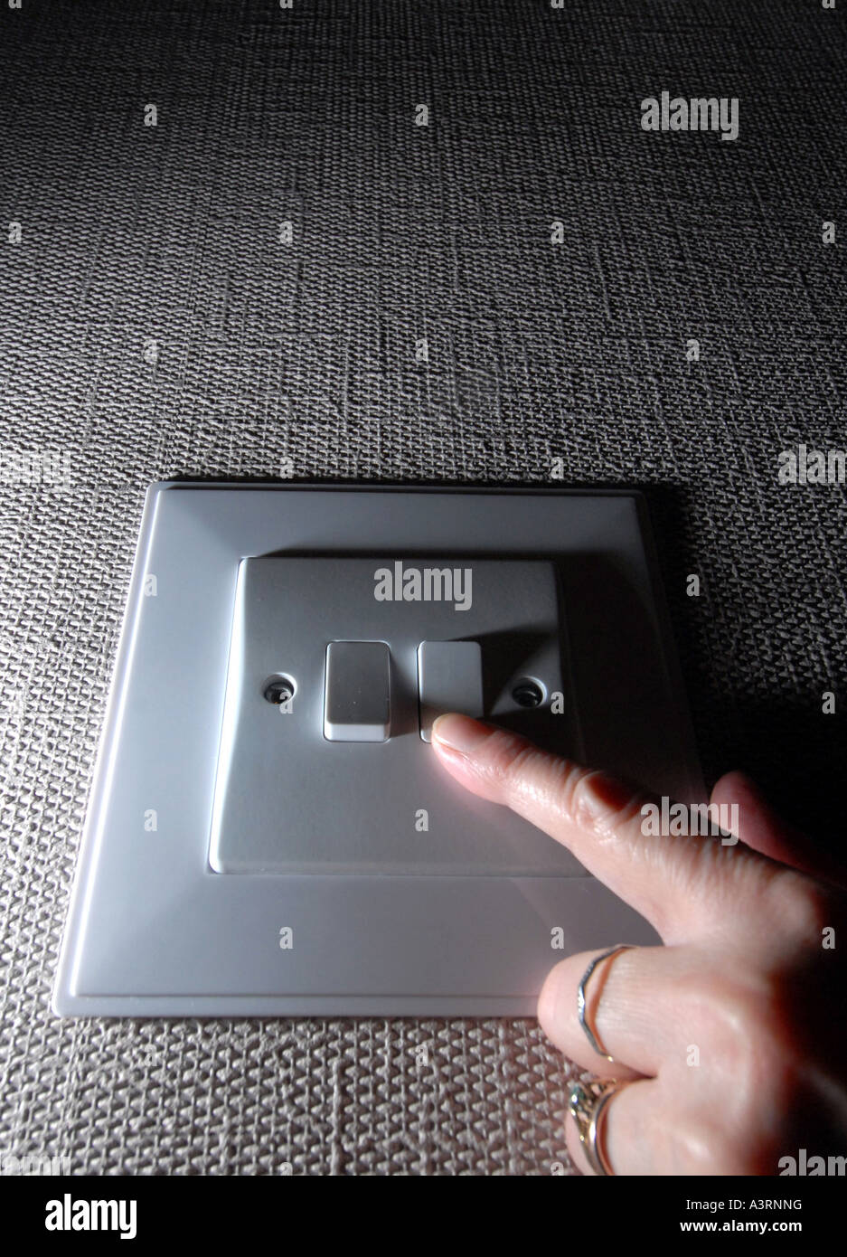 Womans hand light switch High Resolution Stock Photography and Images ...