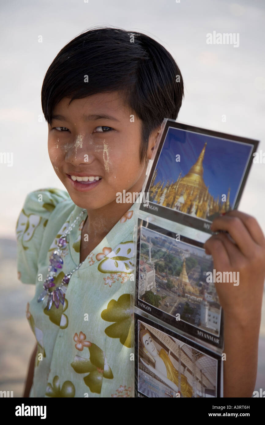 Girl selling postcards, Yangon, Myanmar Stock Photo - Alamy