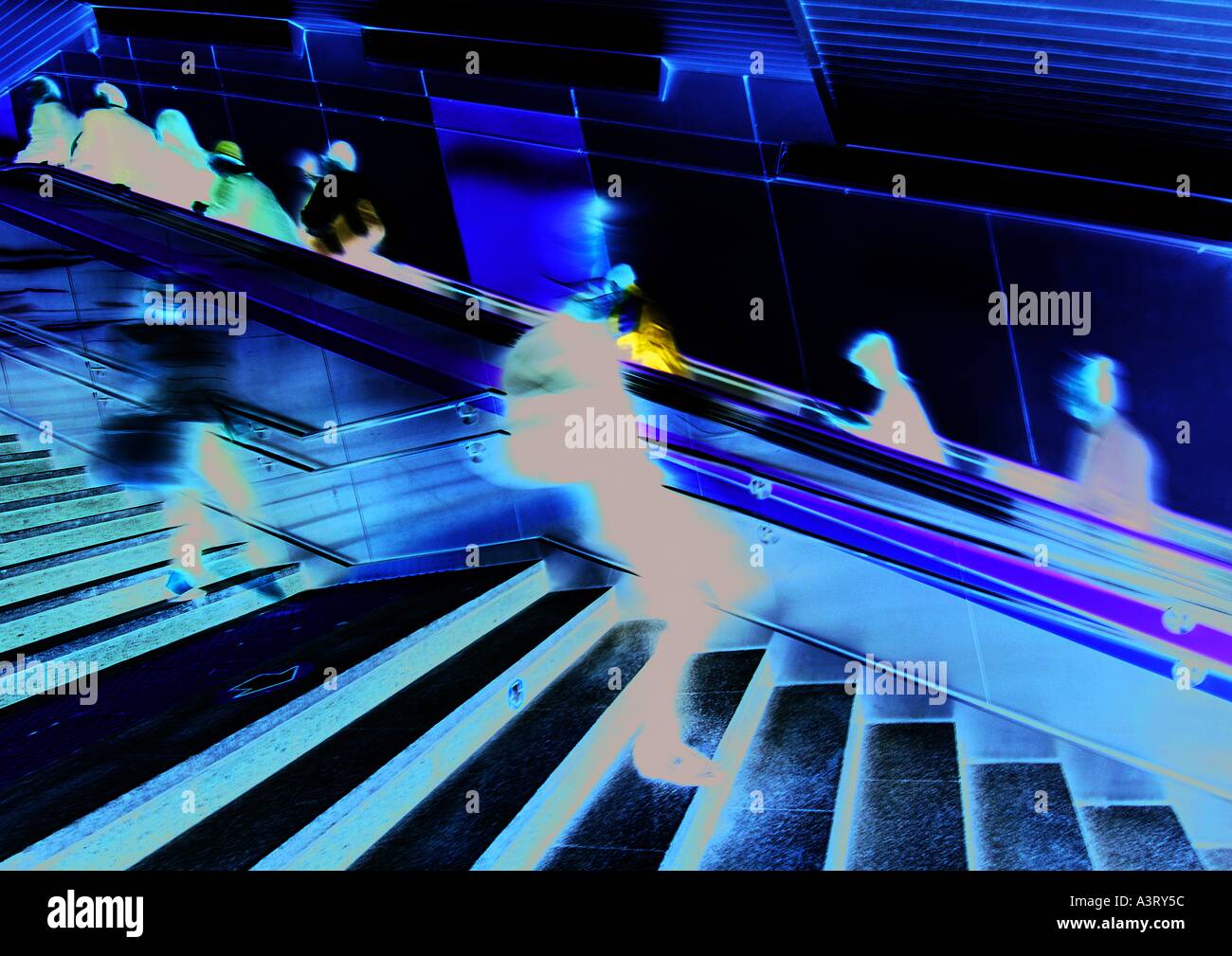 Holding escalator rail hi-res stock photography and images - Alamy