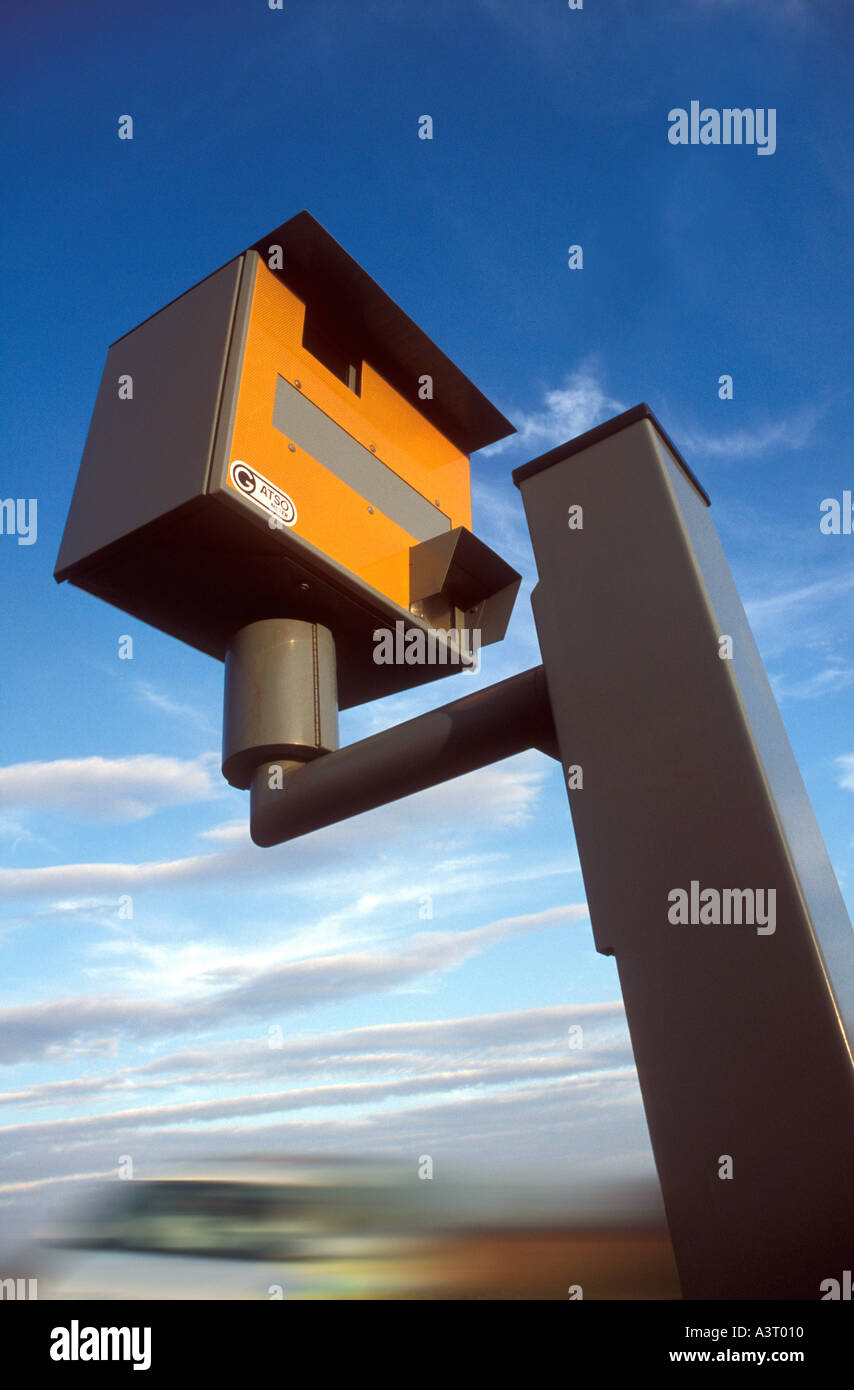 Roadside speed camera with the blur of a passing fast car Stock Photo ...