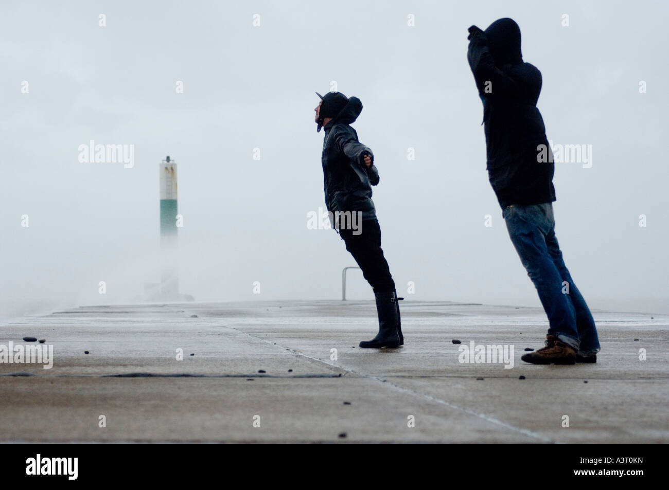 Two men storm hi-res stock photography and images - Alamy