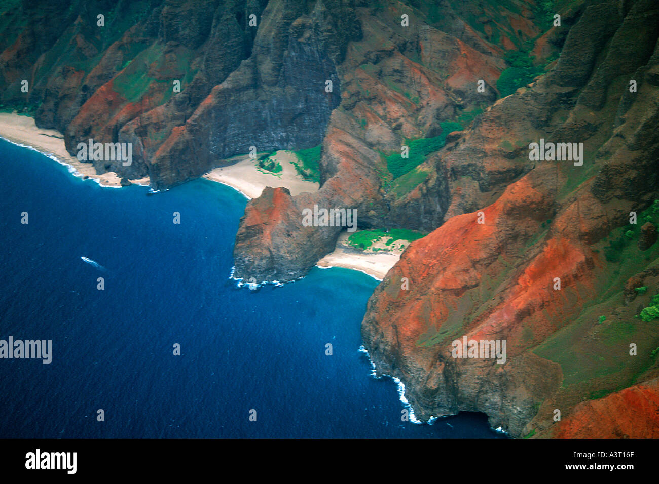 Cliffs and hidden beaches aerial view of Napali coast Kauai Hawaii N ...