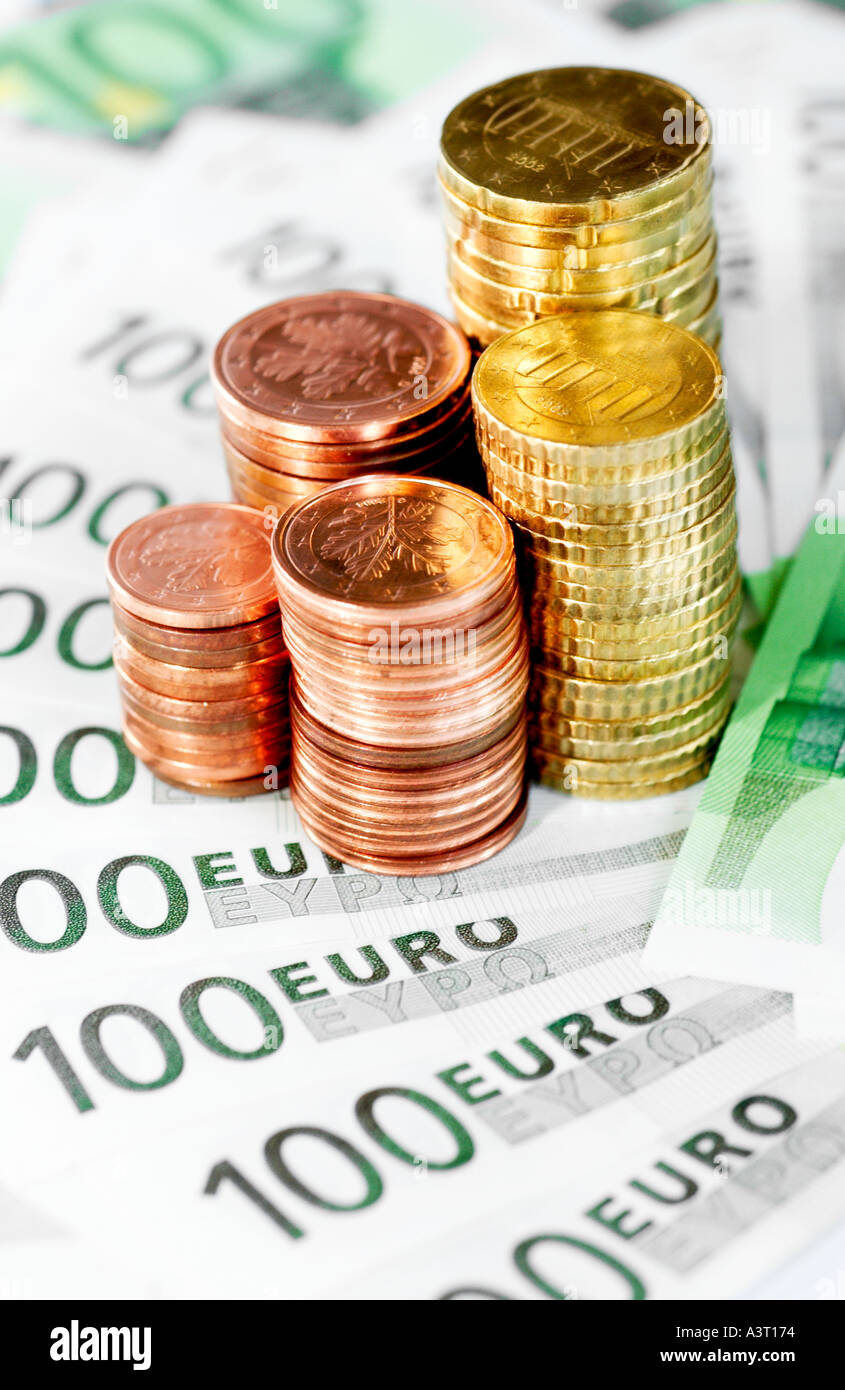 100 euro bills and coins Stock Photo - Alamy