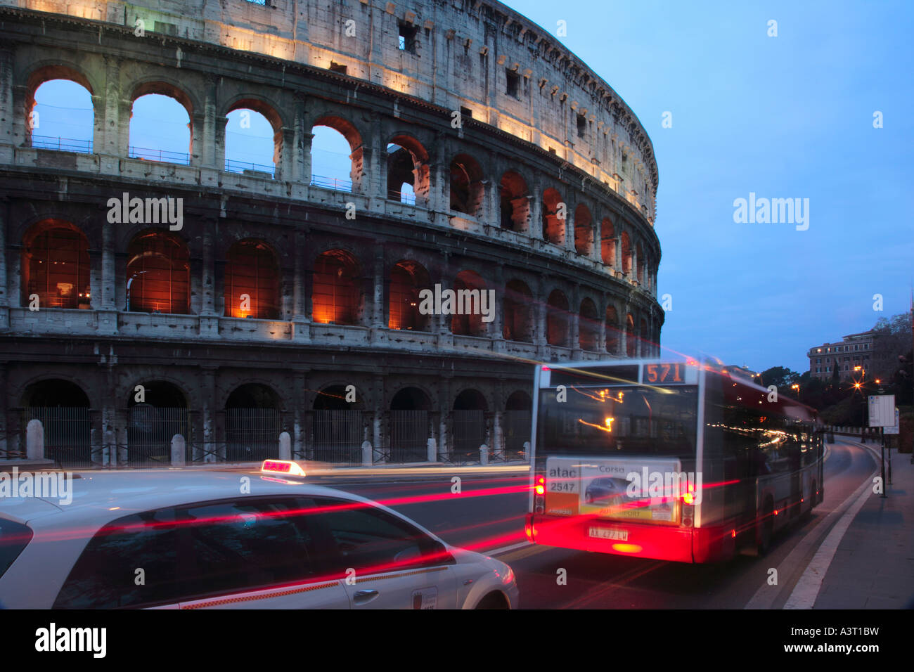 Bus and Taxi passing The Colosseum on the Via Dei Fori Imperiali in ...