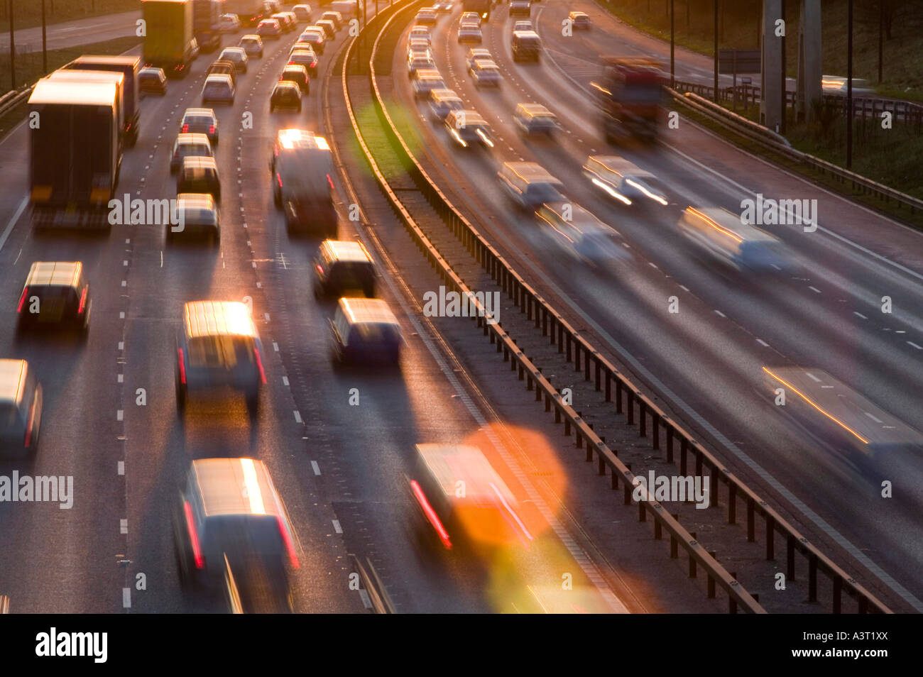 rush hour traffic on the M60 motorway near Manchester at sunset, UK ...