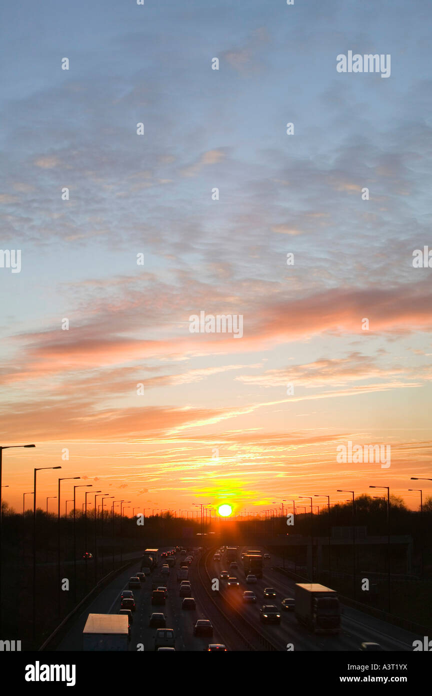 rush hour traffic on the M60 motorway near Manchester at sunset, UK ...