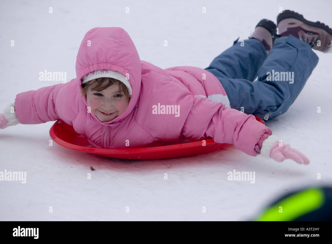 Children sledging in Aviemore, Scotland, UK Stock Photo - Alamy