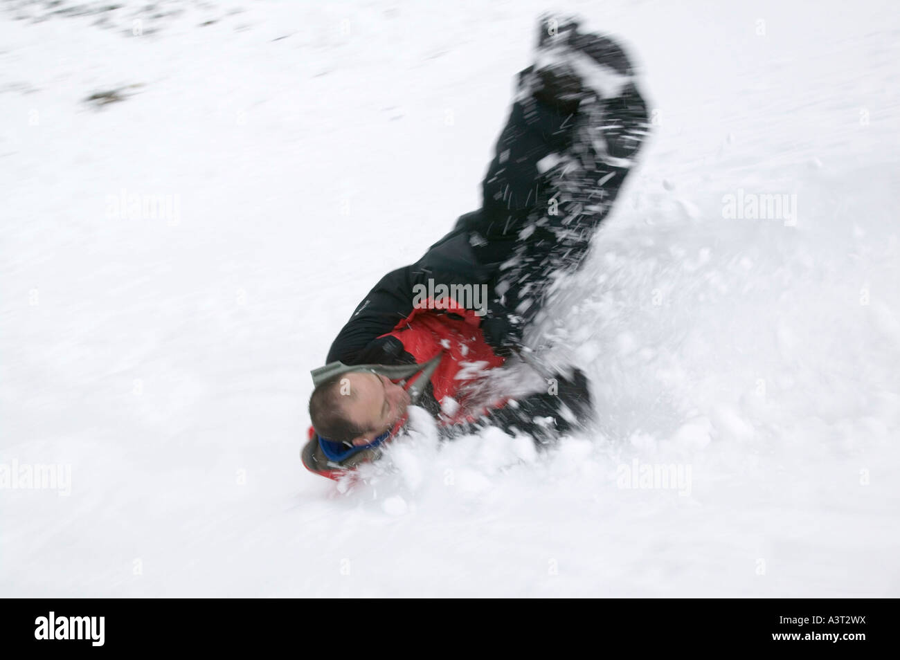 mountain rescue team members practice ice axe arrests in the Cairngorm ...