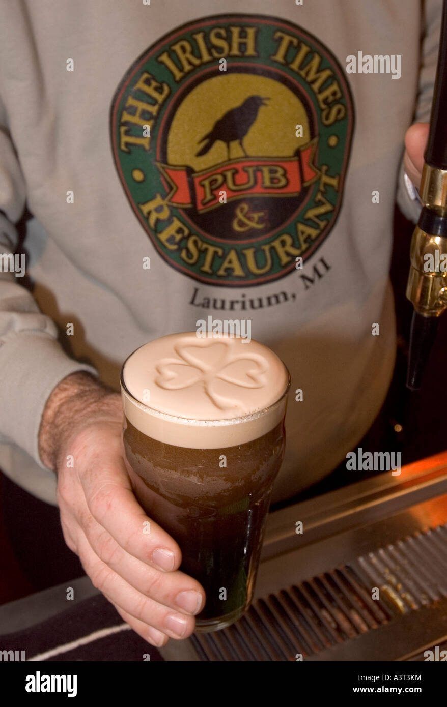 Guinness beer with shamrock in foam Stock Photo - Alamy