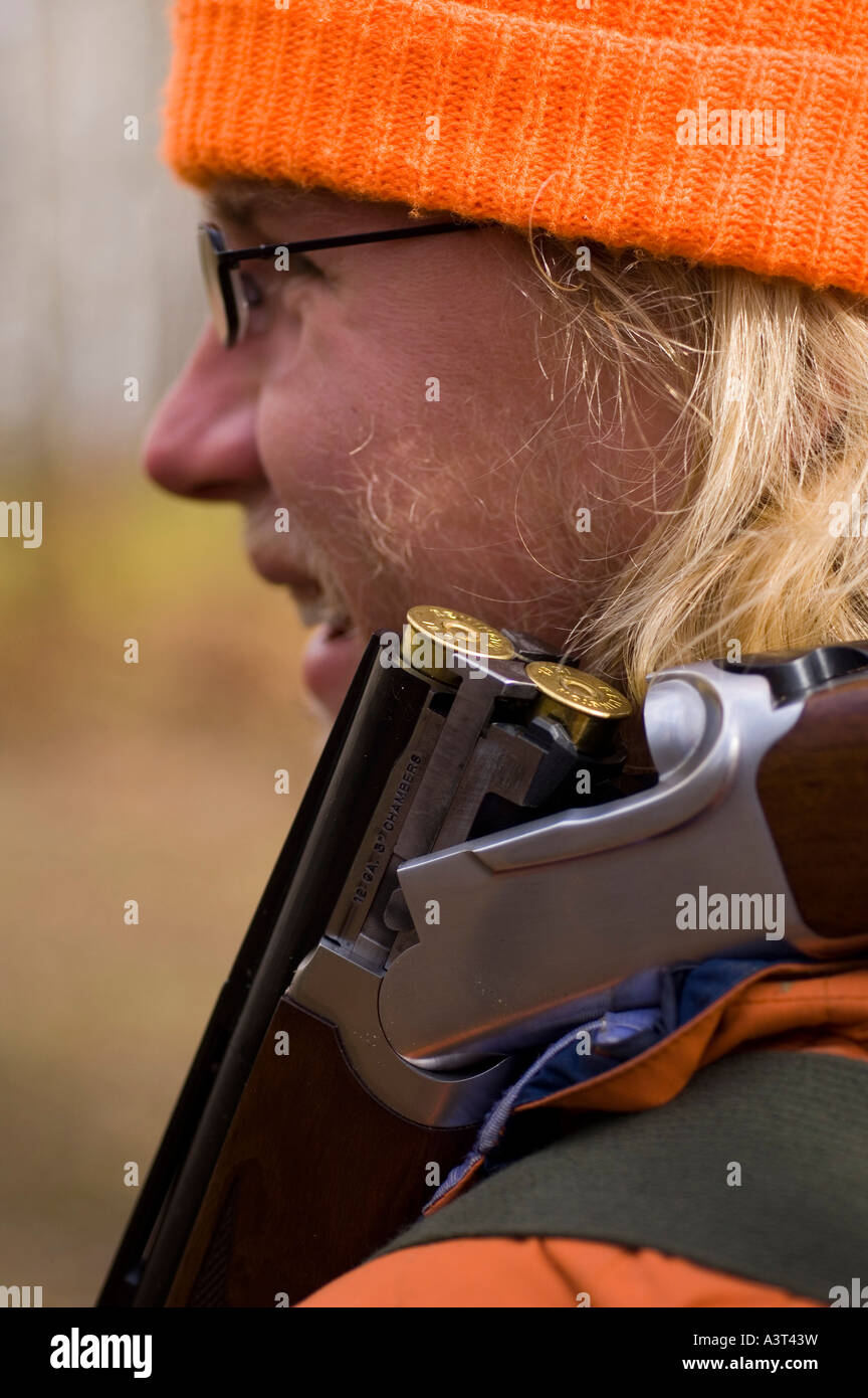 Man shotgun over shoulder hi-res stock photography and images - Alamy