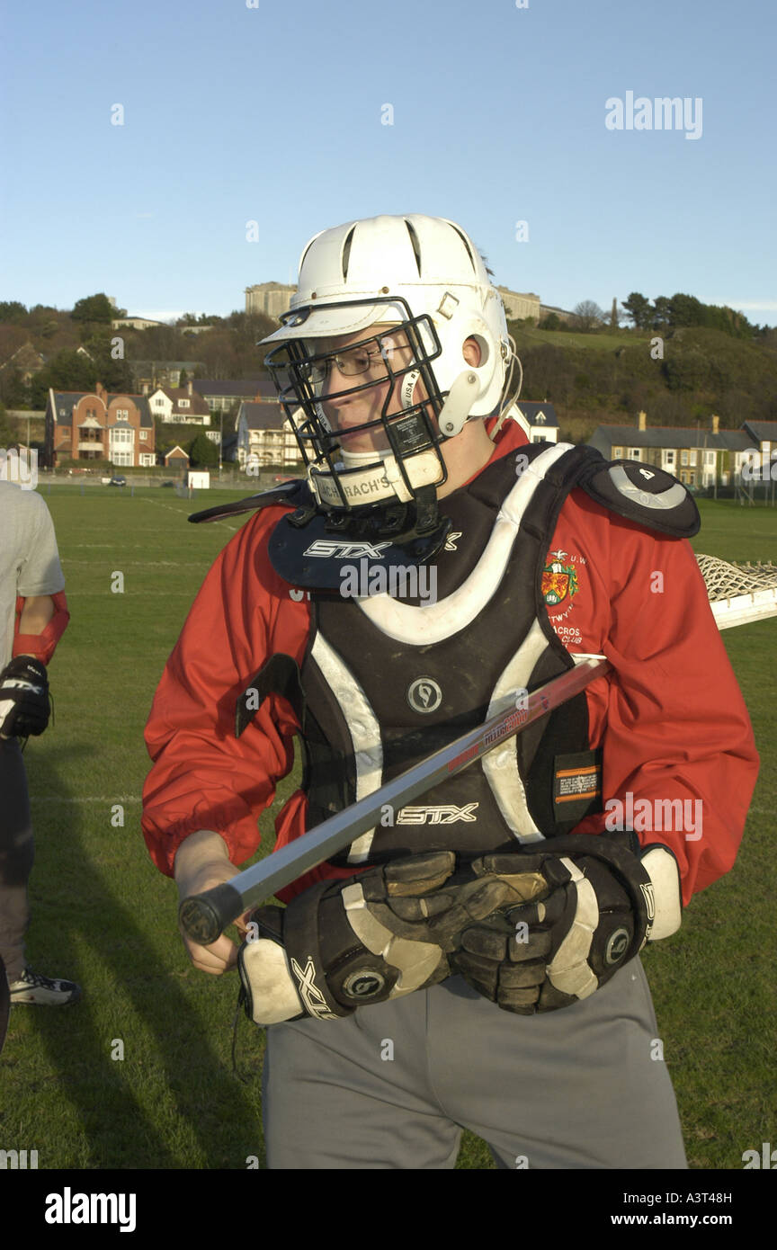male Lacrosse player wearing full protective padding Aberystwyth ...